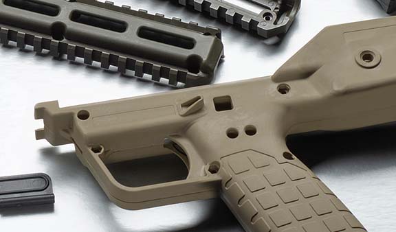 Custom plastic injection molded firearms components